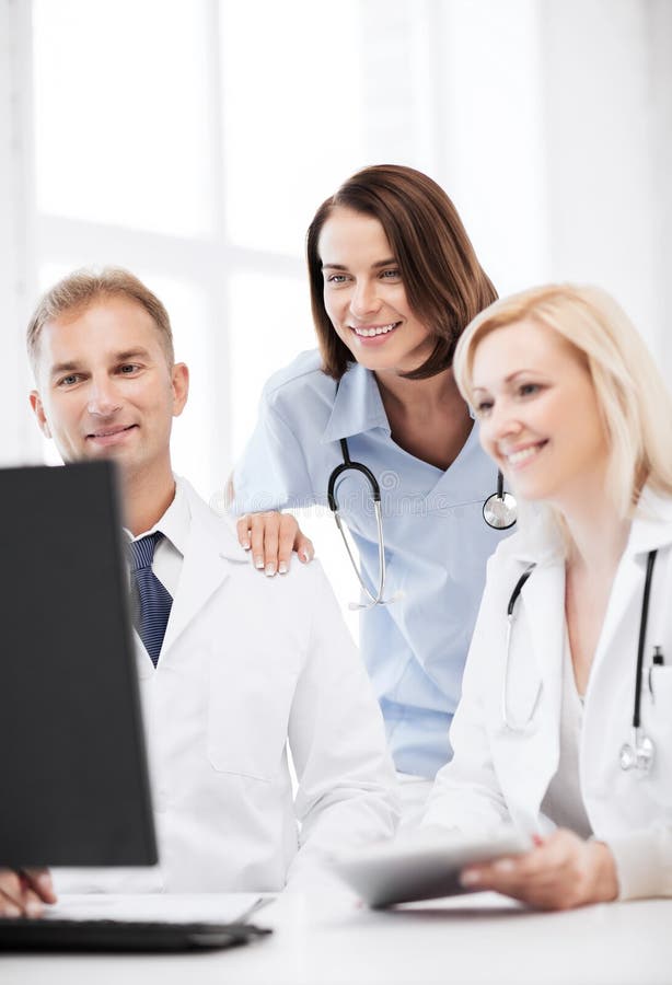 Doctors Looking at Computer on Meeting Stock Image - Image of medicine ...