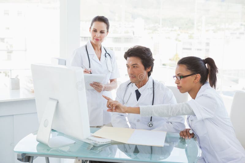 Doctors Looking at the Computer Monitor Stock Image - Image of ...