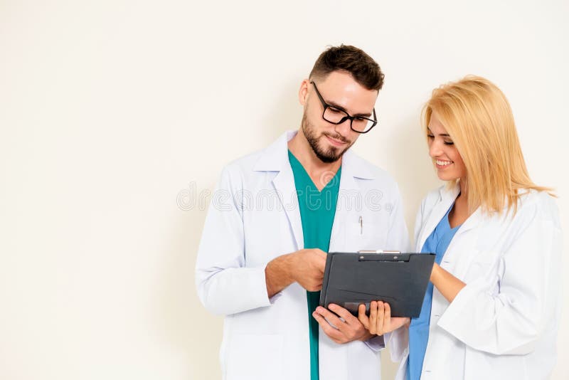 Doctors Looking and Discussing on Documents Paper. Stock Image - Image ...