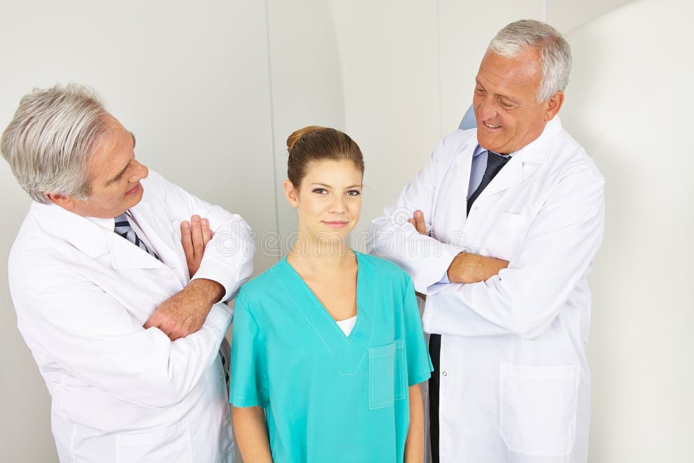 Doctors Looking Sproudly at MTA Stock Photo - Image of doctors ...