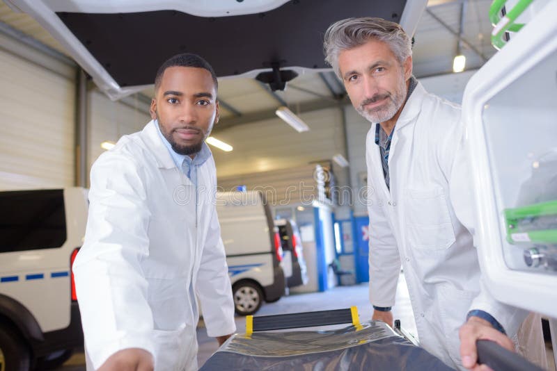 Doctors Moving Mobile Medical Bed Stock Photo - Image of ambulatory ...