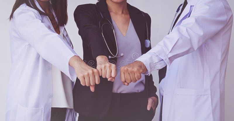 Doctors and Nurses Coordinate Hands. Concept Teamwork Stock Photo ...