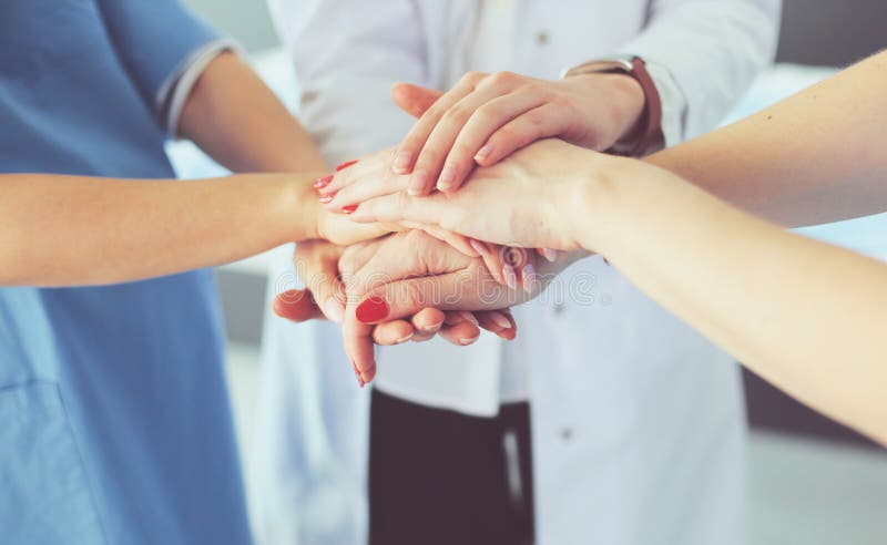 Doctors and Nurses in a Medical Team Stacking Hands Stock Photo - Image ...
