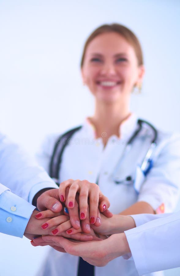 Doctors and Nurses in a Medical Team Stacking Hands Stock Image - Image ...