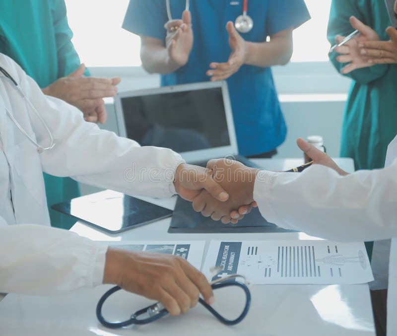 Doctors and Nurses in a Medical Team Stacking Hands Stock Image - Image ...