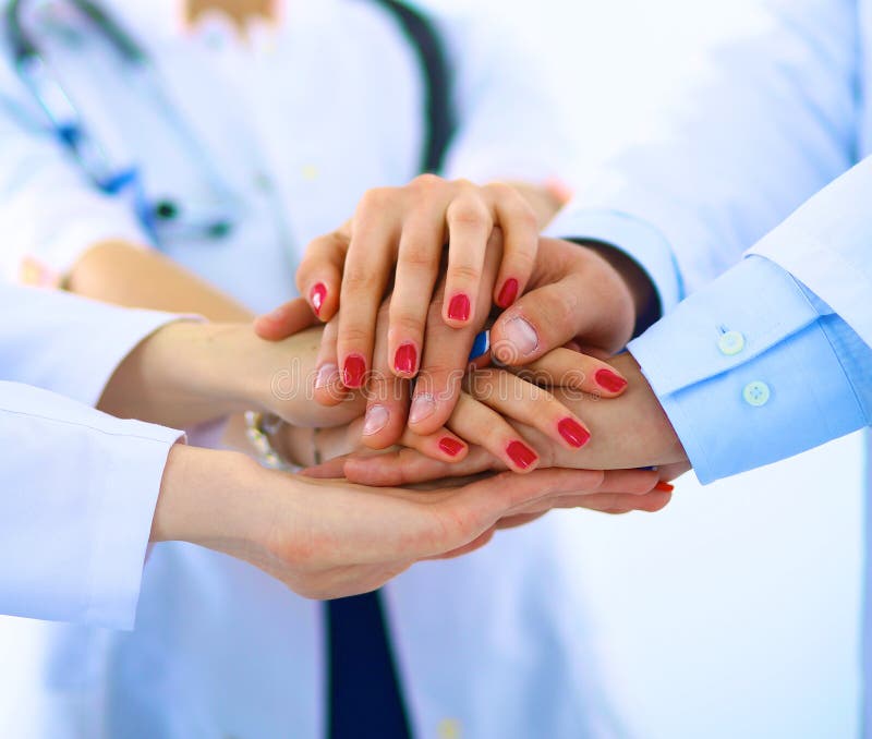 Doctors and Nurses in a Medical Team Stacking Hands Stock Image - Image ...