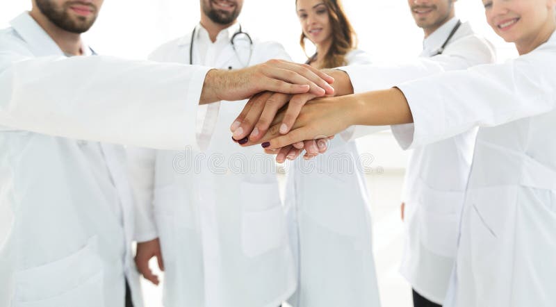 Doctors and Nurses in a Medical Team Stacking Hands Stock Photo - Image ...