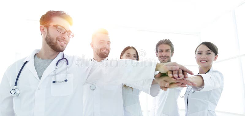 Doctors and Nurses in a Medical Team Stacking Hands Stock Image - Image ...