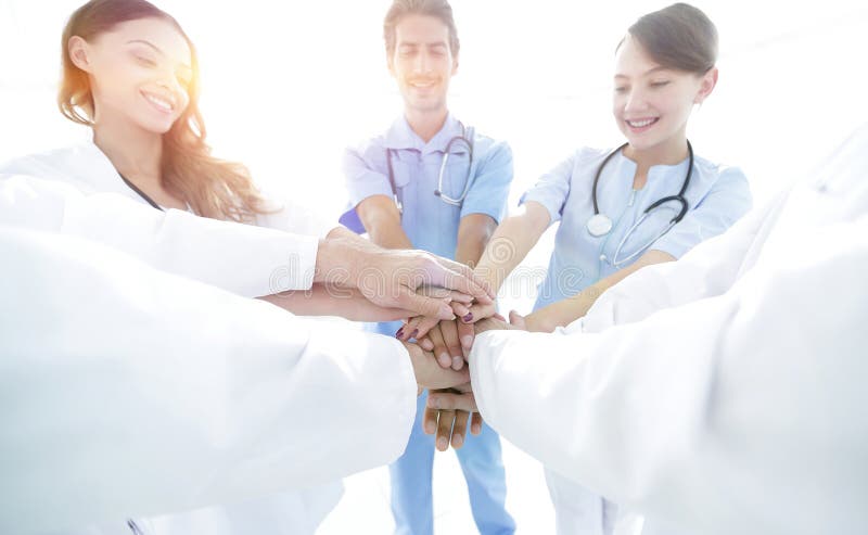 Doctors and Nurses in a Medical Team Stacking Hands Stock Photo - Image ...