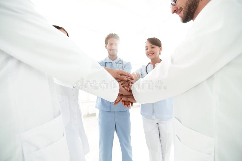 Doctors and Nurses in a Medical Team Stacking Hands Stock Photo - Image ...