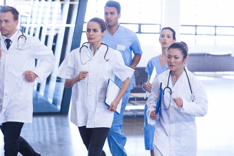 Doctors and Nurses Rushing for Emergency Stock Photo - Image of intern ...