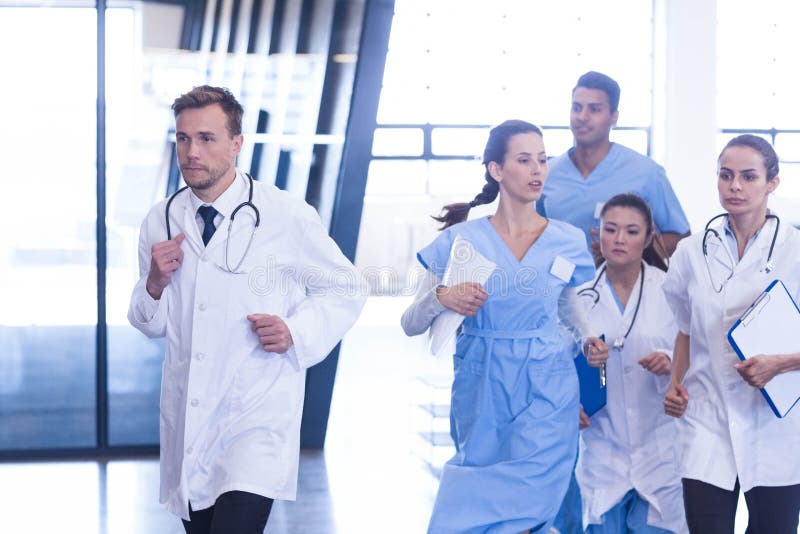 Doctors and Nurses Rushing for Emergency Stock Photo - Image of medical ...