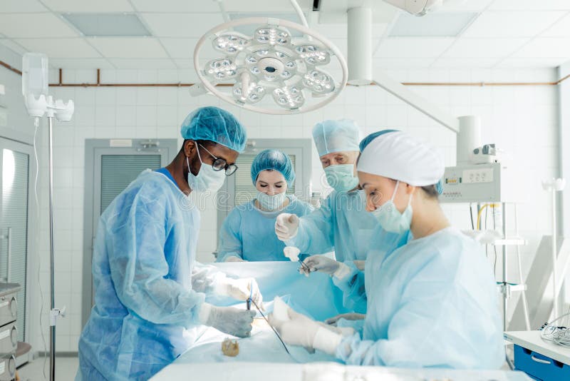 Doctors Opening the Abdomen in the Operating Room Stock Image - Image ...
