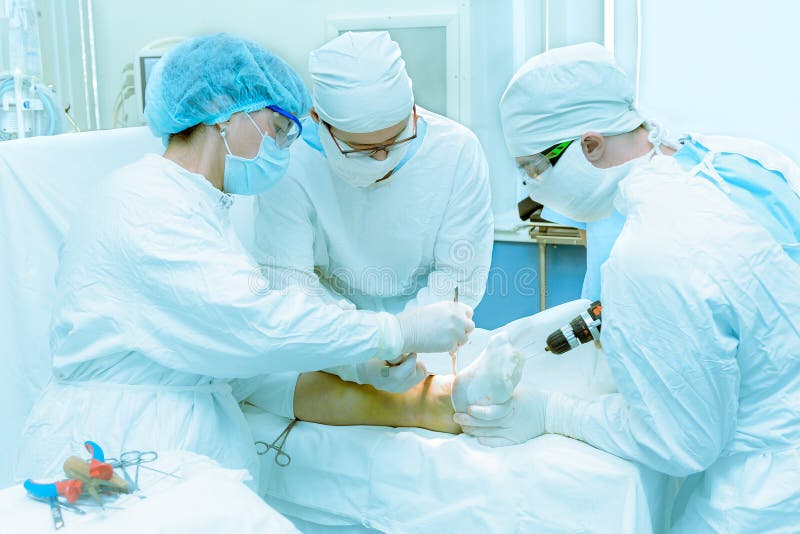 Doctors Operate on a Patient Stock Photo - Image of doctor, treatment ...