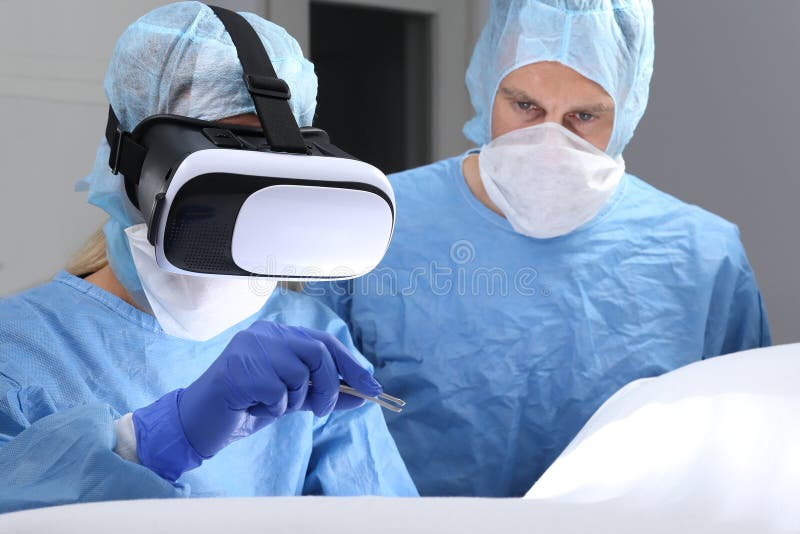 Portrait of Doctor Team are Using Virtual Reality Technology To Stock ...