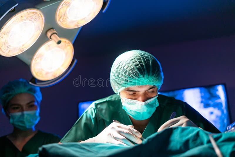 Doctors during Operation in Hospital Operating Room with Patient. Stock ...