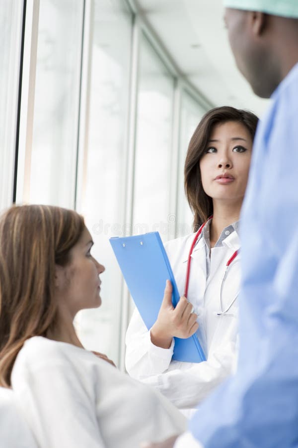 Doctors and Patient stock image. Image of expertise, caucasian - 16905003