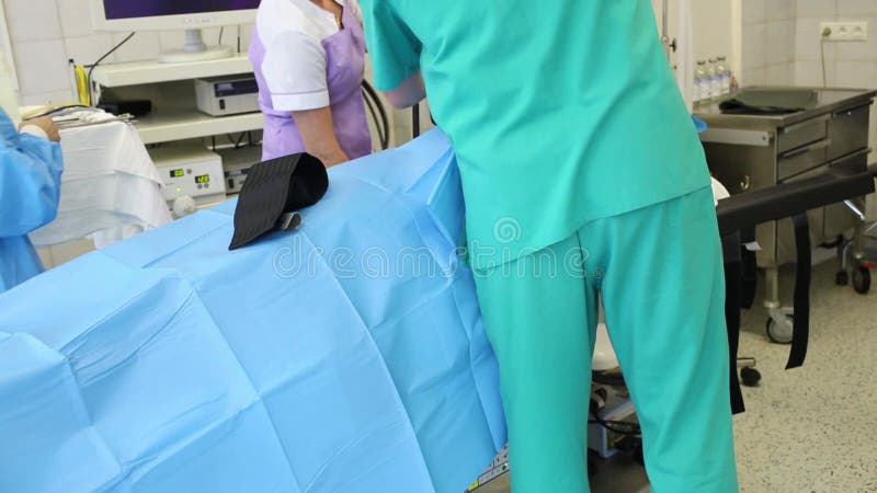 Doctors Preparing Patient for Surgery on the Stock Video - Video of ...