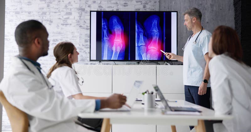 Doctors and Radiologists Discussing X-ray Images Stock Photo - Image of ...