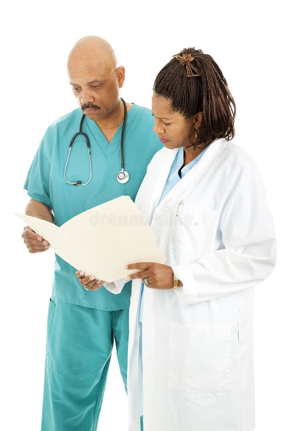 Doctors Reading Chart stock photo. Image of african, healthcare - 16286462