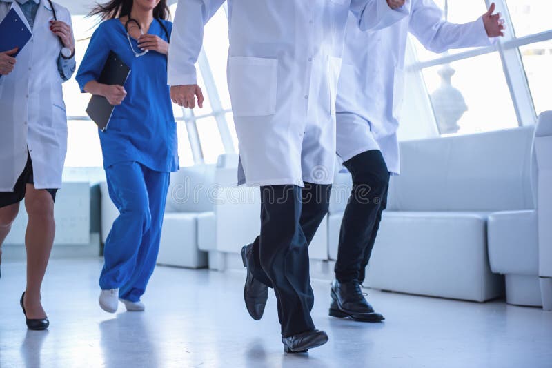 Doctors rushing for help stock image. Image of hurry - 292050139