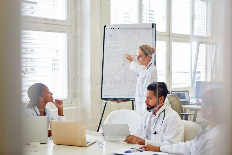 Doctors in Seminar Presentation Stock Photo - Image of together ...