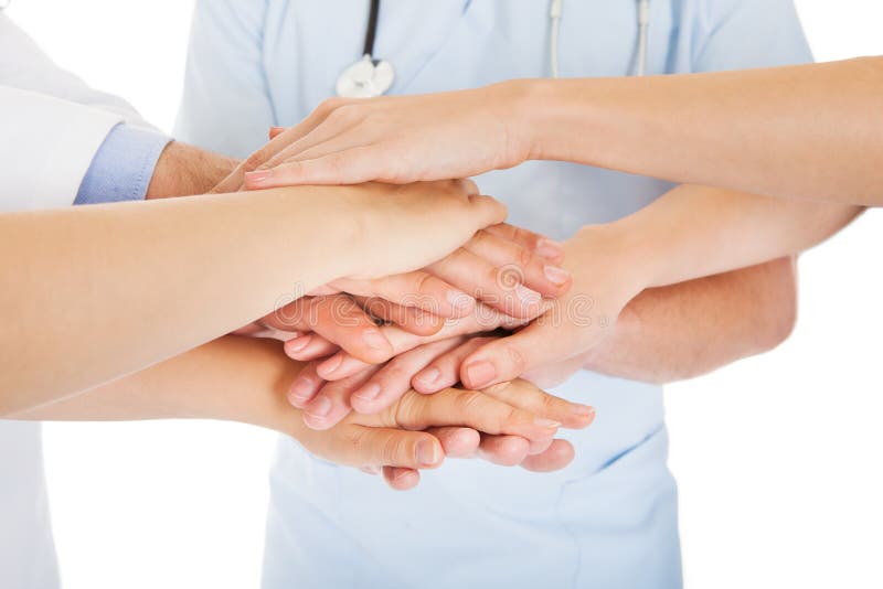 Doctors stacking hands stock image. Image of male, practitioner - 52408471