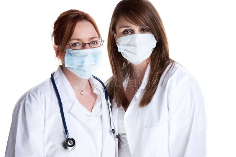Doctors and surgical masks stock photo. Image of looking - 14237514