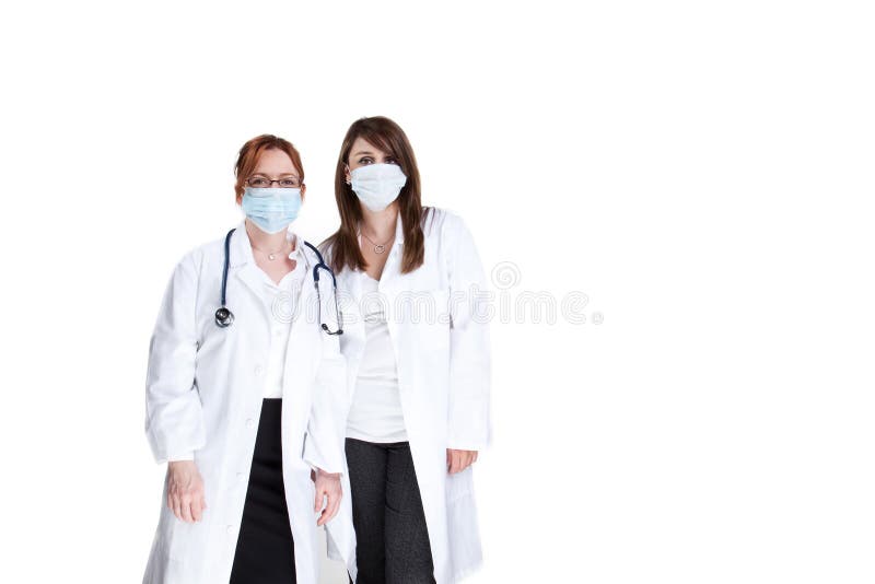 Doctors and surgical masks stock photo. Image of looking - 14237514