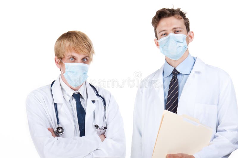 Doctors and surgical masks stock photo. Image of looking - 14237514