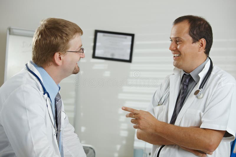 Doctor telling good news stock photo. Image of doctors - 11717286
