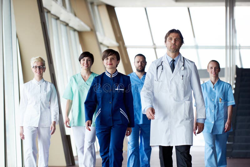 Doctors team walking stock image. Image of doctor, medicine - 62400963