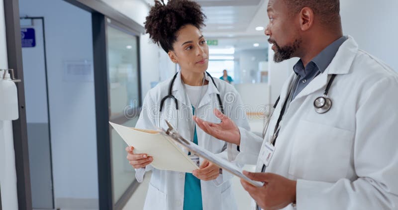 Doctors, Teamwork and Advice with Documents, Hospital Folder or Patient ...