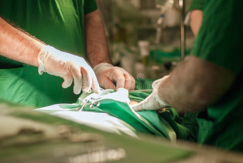 Doctors With Tools In Hands Making Surgery Stock Photo - Image of ...