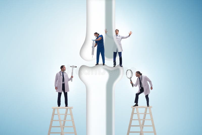 Doctors Treating the Bone Joint Stock Photo - Image of anatomical ...