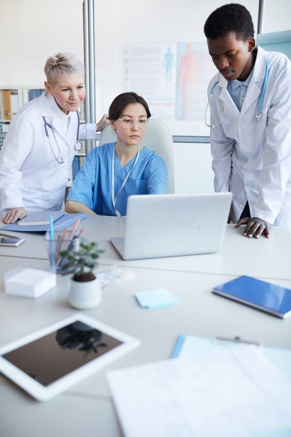 Doctors Using Computer in Clinic Stock Image - Image of africanamerican ...