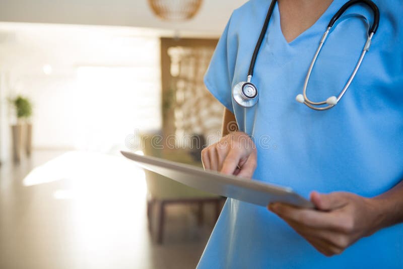 Doctors Using Digital Tablet Stock Image - Image of hospital ...