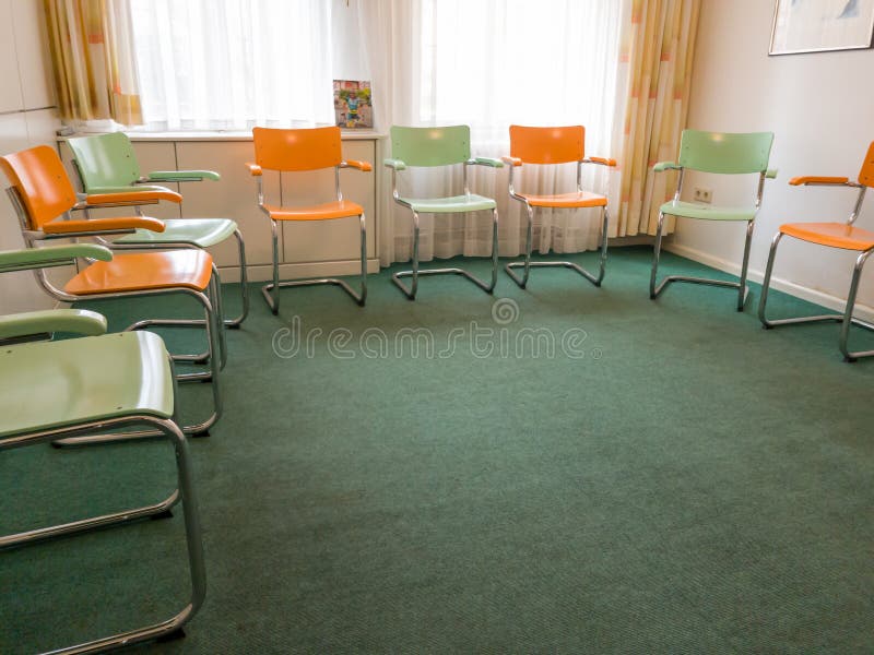 Chairs in room stock photo. Image of room, orange, green - 110450134