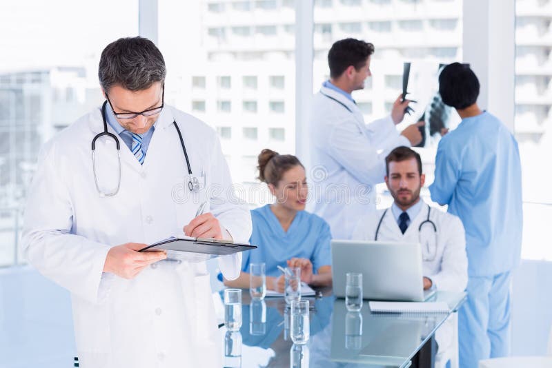 Doctors at Work in Medical Office Stock Photo - Image of medical ...