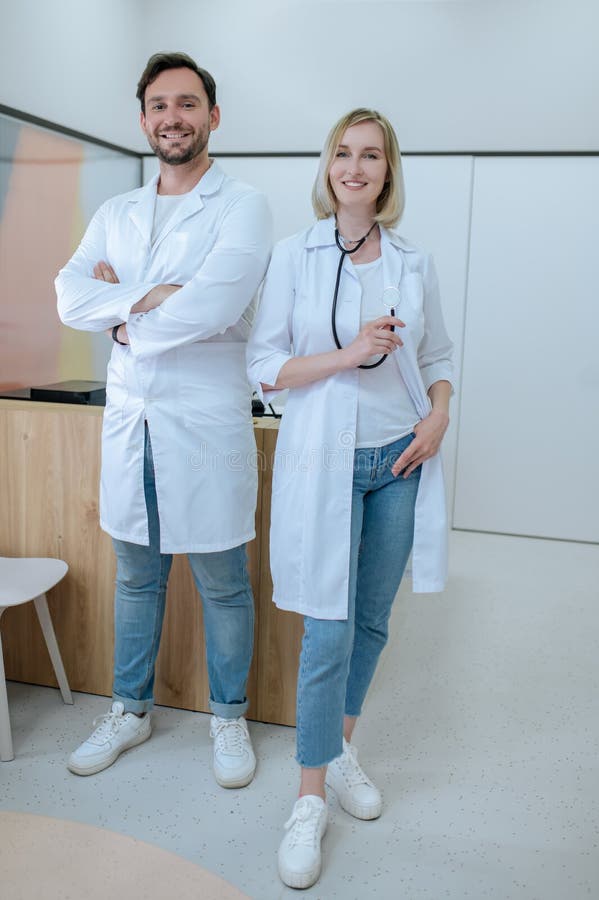 Two Doctors in Lab Coats in the Clinic Stock Photo - Image of ...