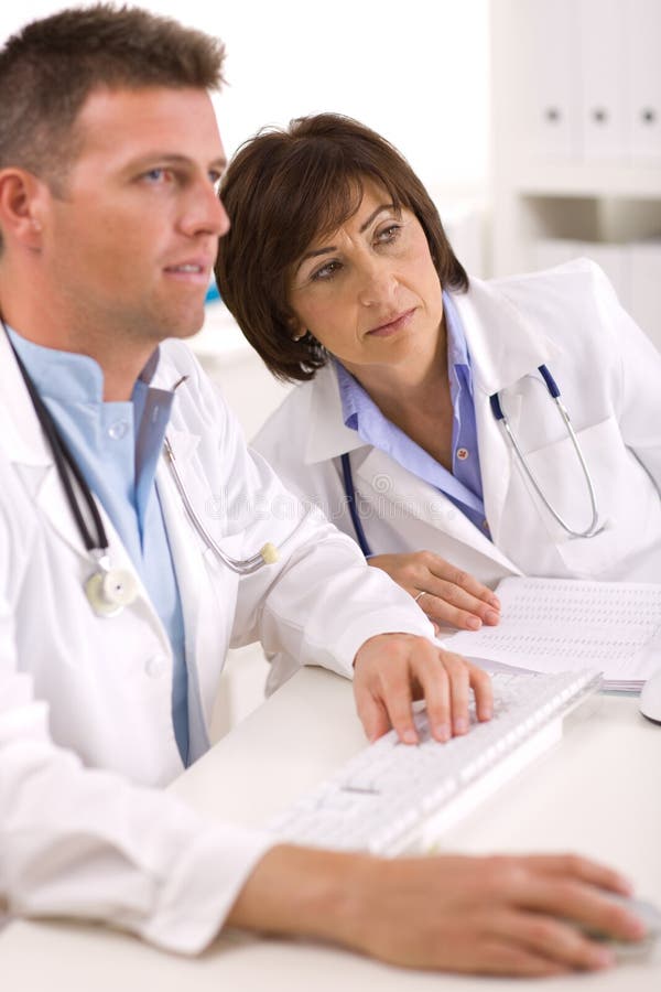 Doctors working at office stock photo. Image of indoor - 7975886