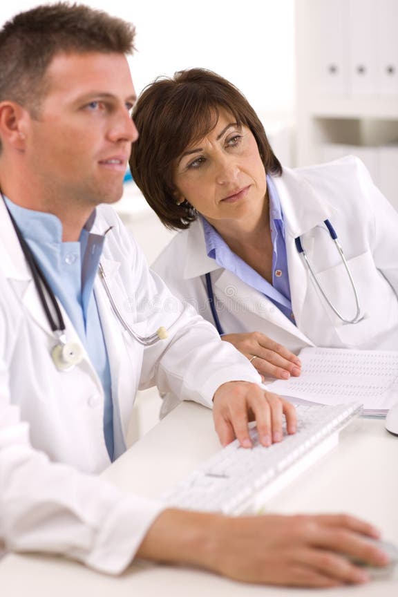 Doctors working at office stock photo. Image of indoor - 7975886