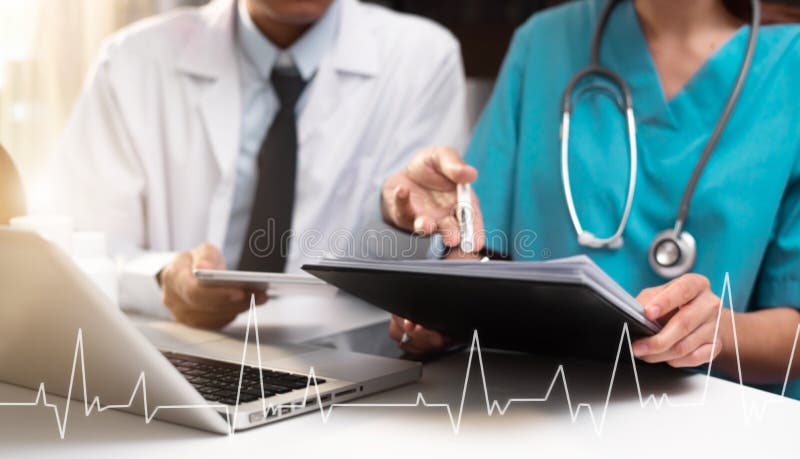 Doctors Working Together on Digital Tablet Healthcare Doctor Technology ...