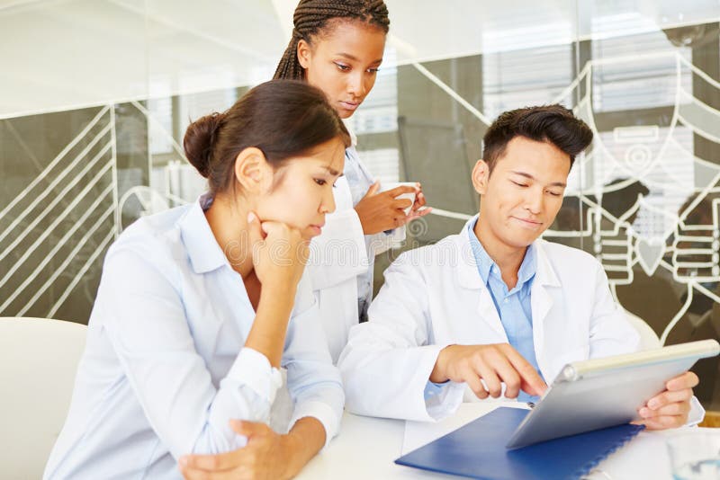 Doctors Working Together with Tablet Stock Photo - Image of doctor ...