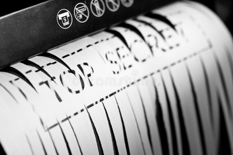 Document in paper shredder stock image. Image of word - 12577385