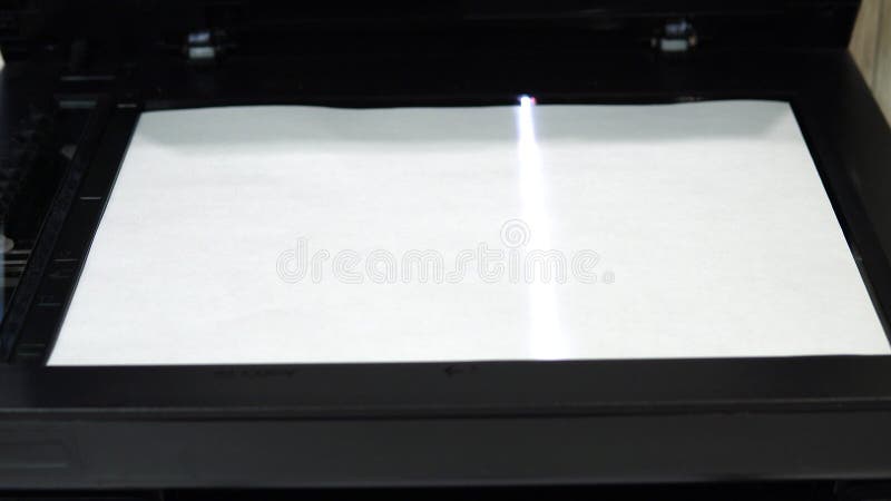 Document Scanning Process. Scanner in Operation Scans a Sheet of Paper ...