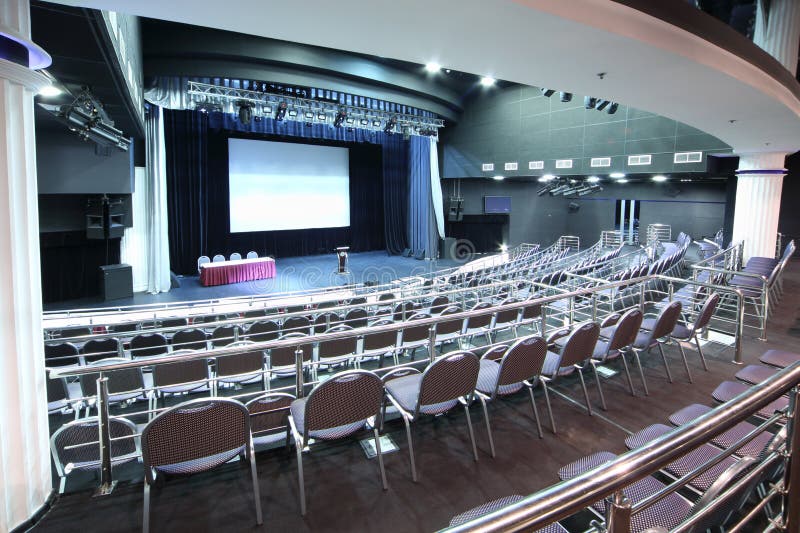 Document Stand on Stage and Back of Rows of Chairs Stock Image - Image ...