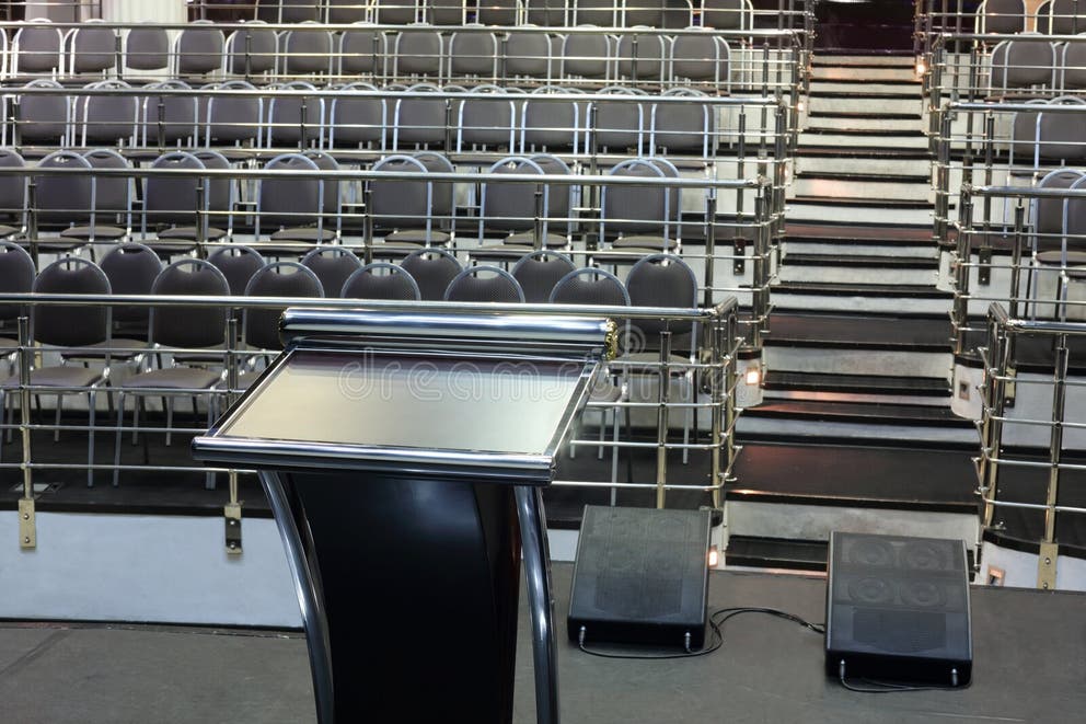 Document Stand on Stage and Rows of Chairs with Stock Photo - Image of ...