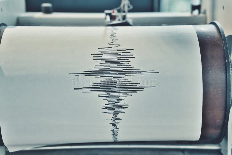 A Sismograph Recording Device with Seismic Waves Traced on Paper Stock ...