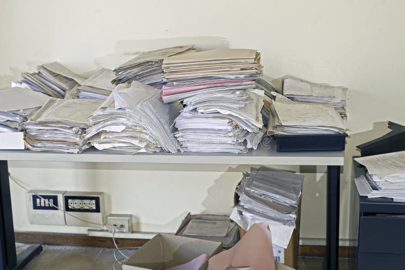 Messy Disorganized Desk stock image. Image of color, office - 31017749